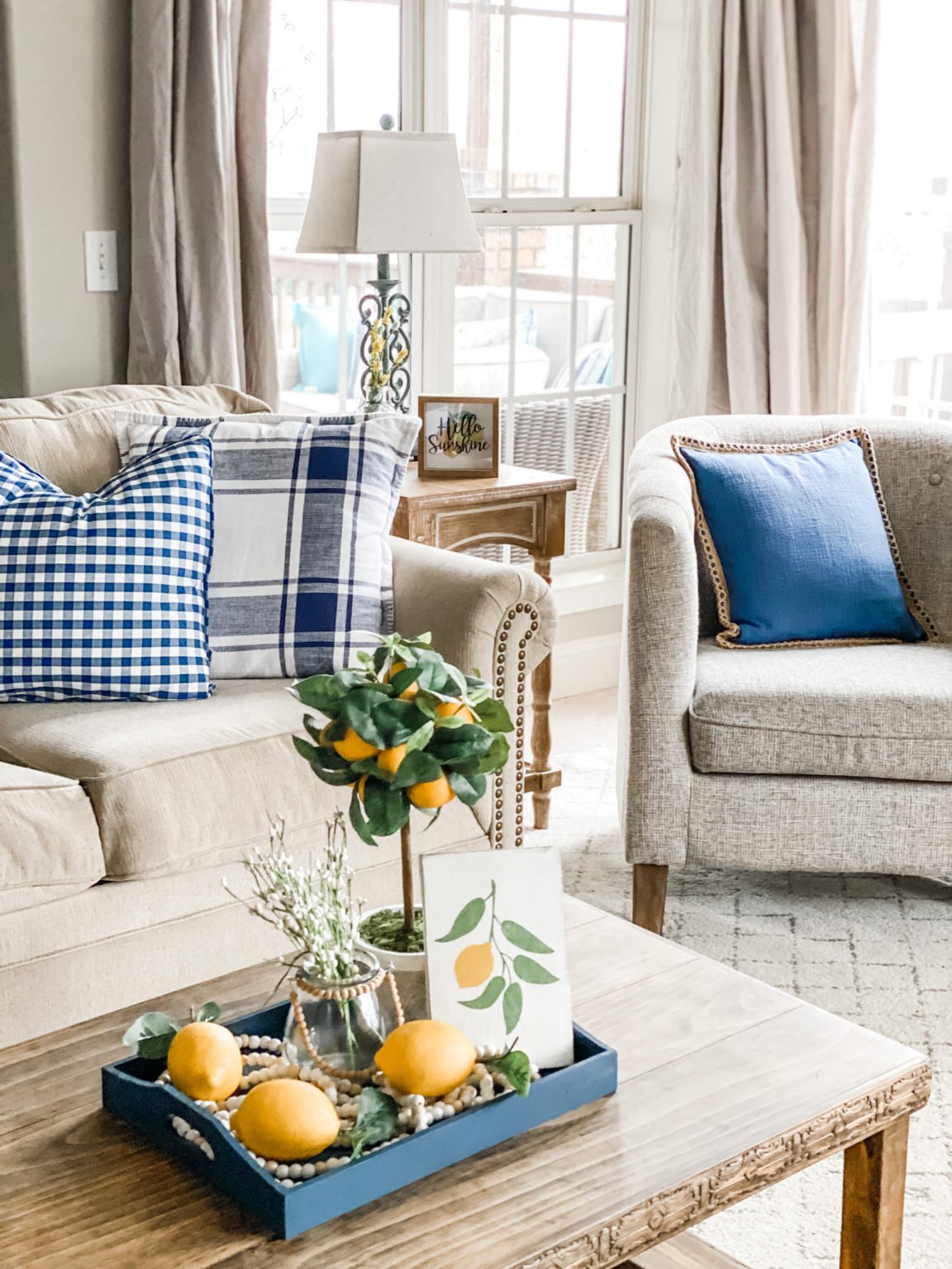 Navy decor in the living room for Spring with yellow accents ...